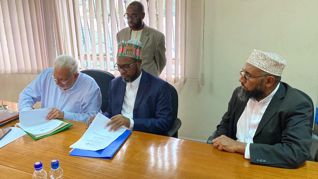IOU VC Dr Cherno Omar Barry signs MoU at Islamia Madrassa Society ...